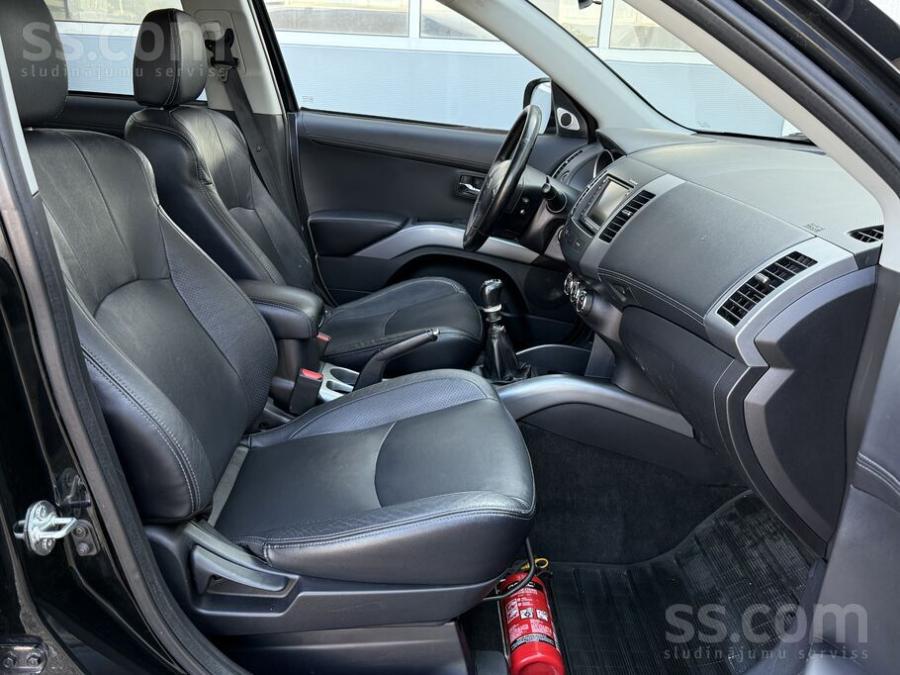 Melns Mitsubishi Outlander 2011 Tukums, ar dzinēja tilpumu 2.20 L un nobraukumu 227 tūkst. km par 6599 €, foto 8 vietnē AUTOMOTO.COM.LV