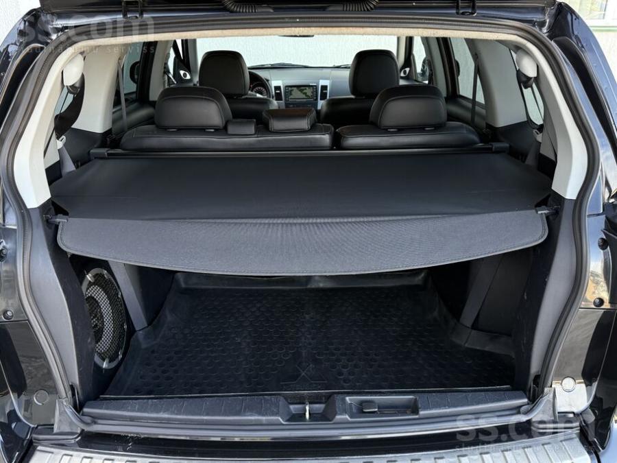 Melns Mitsubishi Outlander 2011 Tukums, ar dzinēja tilpumu 2.20 L un nobraukumu 227 tūkst. km par 6599 €, foto 11 vietnē AUTOMOTO.COM.LV
