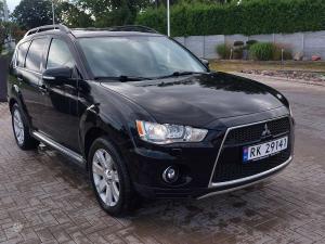 Black Mitsubishi Outlander 2011 in Taurage, with an engine capacity of 2.18 L and mileage of 238 thousand km for 3600 €, photo  on AUTOMOTO.COM.LV