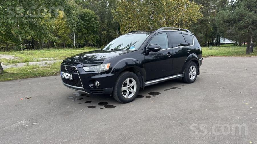 Melns Mitsubishi Outlander 2011 Rīga, ar dzinēja tilpumu 2.40 L un nobraukumu 371 tūkst. km par 4250 €, foto 1 vietnē AUTOMOTO.COM.LV