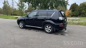 Melns Mitsubishi Outlander 2011 Rīga, ar dzinēja tilpumu 2.40 L un nobraukumu 371 tūkst. km par 4250 €, foto 4 vietnē AUTOMOTO.COM.LV