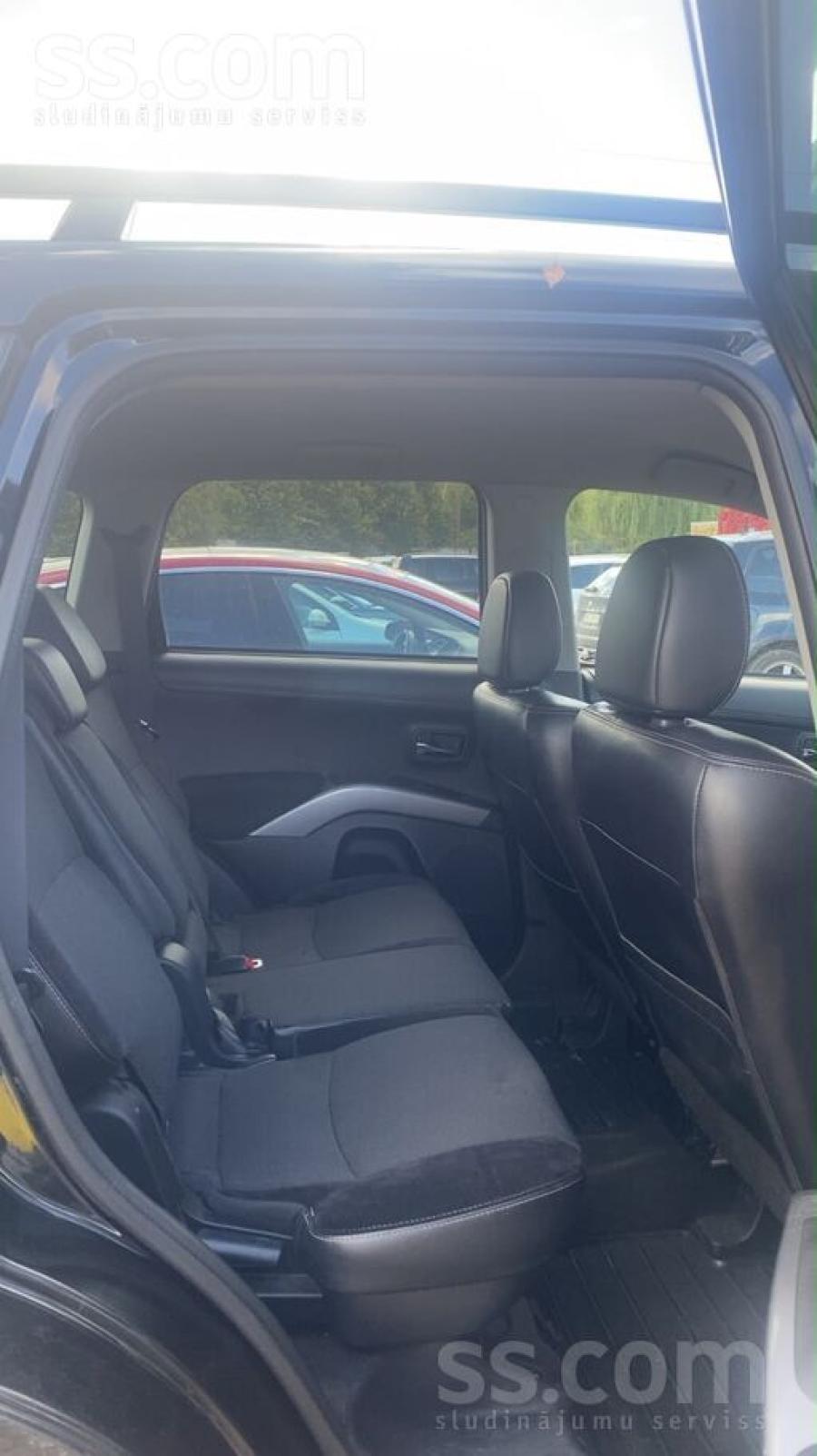 Melns Mitsubishi Outlander 2011 Rīga, ar dzinēja tilpumu 2.40 L un nobraukumu 371 tūkst. km par 4250 €, foto 8 vietnē AUTOMOTO.COM.LV