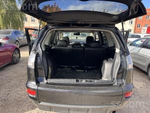 Melns Mitsubishi Outlander 2011 Rīga, ar dzinēja tilpumu 2.40 L un nobraukumu 371 tūkst. km par 4250 €, foto 9 vietnē AUTOMOTO.COM.LV