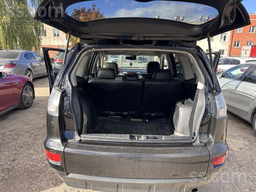 Melns Mitsubishi Outlander 2011 Rīga, ar dzinēja tilpumu 2.40 L un nobraukumu 371 tūkst. km par 4250 €, foto 9 vietnē AUTOMOTO.COM.LV