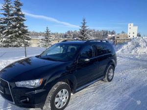 Black Mitsubishi Outlander 2012 in Utena, with an engine capacity of 0.00 L and mileage of 240 thousand km for 6150 €, photo  on AUTOMOTO.COM.LV