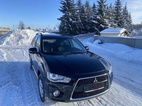 Black Mitsubishi Outlander 2012 in Utena, with an engine capacity of 2.20 L and mileage of 240 thousand km for 5950 €, photo 2 on AUTOMOTO.COM.LV