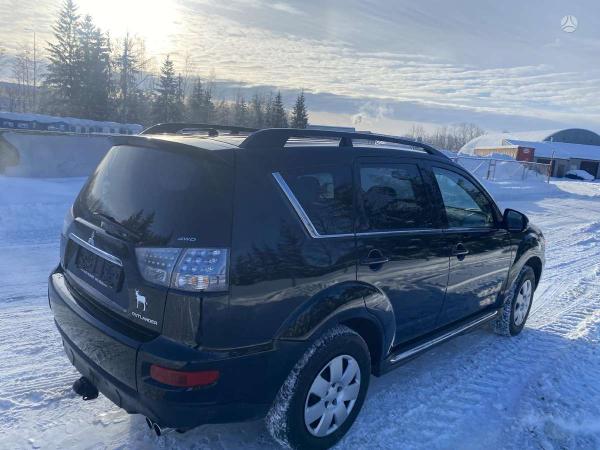 Black Mitsubishi Outlander 2012 in Utena, with an engine capacity of 2.20 L and mileage of 240 thousand km for 5950 €, photo 10 on AUTOMOTO.COM.LV