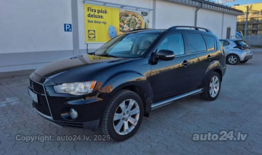 Black Mitsubishi Outlander 2012 in Tallinn, with an engine capacity of 2.20 L and mileage of 283 thousand km for 4950 €, photo 1 on AUTOMOTO.COM.LV