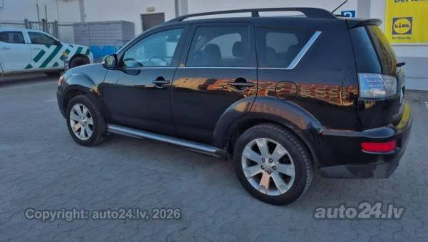 Melns Mitsubishi Outlander 2012 Tallina, ar dzinēja tilpumu 2.20 L un nobraukumu 283 tūkst. km par 4950 €, foto 2 vietnē AUTOMOTO.COM.LV
