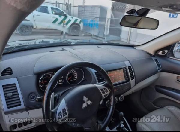 Melns Mitsubishi Outlander 2012 Tallina, ar dzinēja tilpumu 2.20 L un nobraukumu 283 tūkst. km par 4950 €, foto 8 vietnē AUTOMOTO.COM.LV