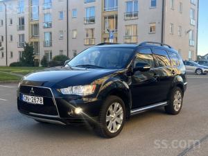 Black Mitsubishi Outlander 2012 in Riga, with an engine capacity of 2.20 L and mileage of 300 thousand km for 4350 €, photo  on AUTOMOTO.COM.LV