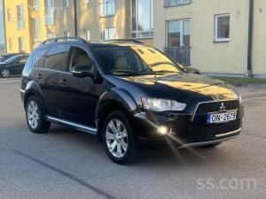 Black Mitsubishi Outlander 2012 in Riga, with an engine capacity of 2.20 L and mileage of 300 thousand km for 4350 €, photo 3 on AUTOMOTO.COM.LV