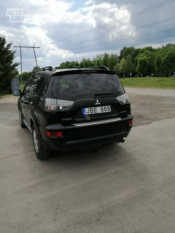 Melns Mitsubishi Outlander 2012 Šauļi, ar dzinēja tilpumu 2.40 L un nobraukumu 184 tūkst. km par 4750 €, foto 1 vietnē AUTOMOTO.COM.LV