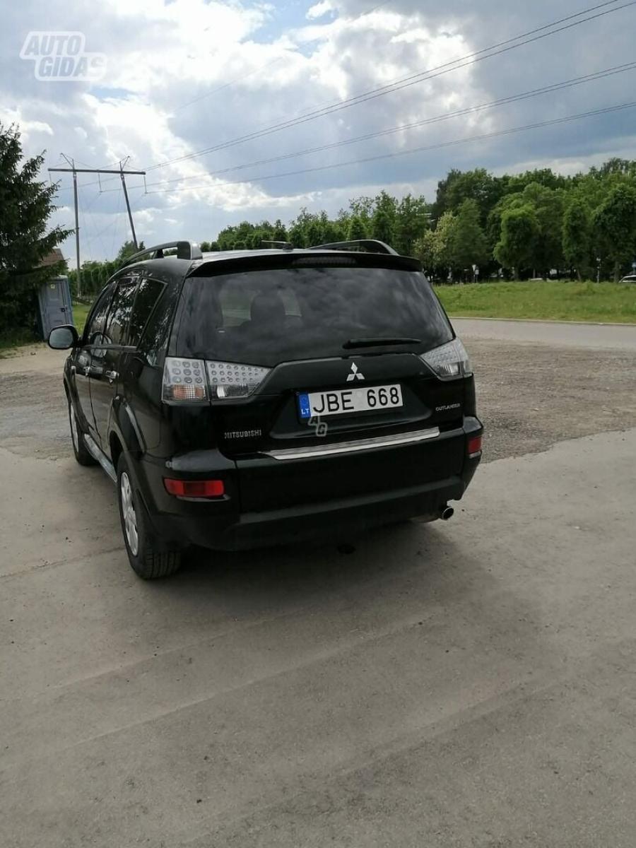 Melns Mitsubishi Outlander 2012 Šauļi, ar dzinēja tilpumu 2.40 L un nobraukumu 184 tūkst. km par 4750 €, foto 1 vietnē AUTOMOTO.COM.LV