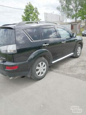 Melns Mitsubishi Outlander 2012 Šauļi, ar dzinēja tilpumu 2.40 L un nobraukumu 184 tūkst. km par 4750 €, foto 8 vietnē AUTOMOTO.COM.LV