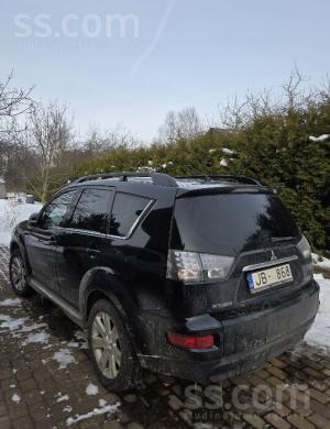 Black Mitsubishi Outlander 2012 in Riga, with an engine capacity of 2.30 L and mileage of 268 thousand km for 4900 €, photo  on AUTOMOTO.COM.LV