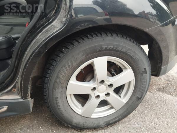 Black Mitsubishi Outlander 2012 in Tukums, with an engine capacity of 2.40 L and mileage of 303 thousand km for 3700 €, photo 5 on AUTOMOTO.COM.LV
