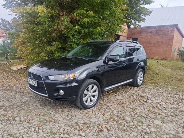Black Mitsubishi Outlander 2012 in Riga, with an engine capacity of 2.20 L and mileage of 0 thousand km for 4550 €, photo 3 on AUTOMOTO.COM.LV
