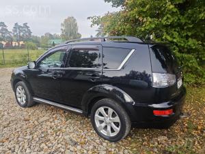 Black Mitsubishi Outlander 2012 in Riga, with an engine capacity of 2.20 L and mileage of 0 thousand km for 4550 €, photo 4 on AUTOMOTO.COM.LV
