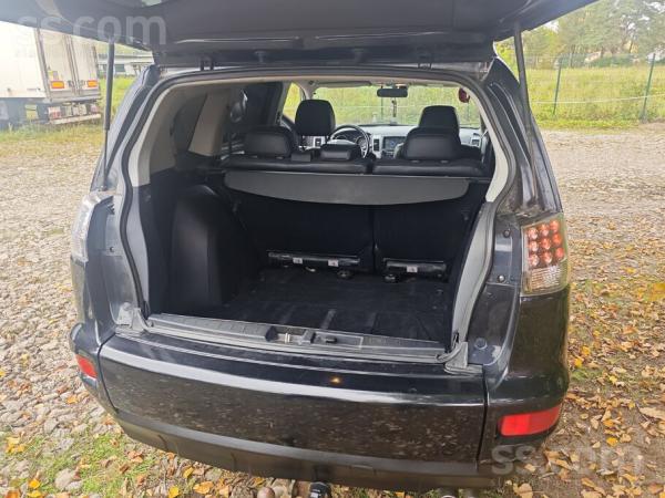 Black Mitsubishi Outlander 2012 in Riga, with an engine capacity of 2.20 L and mileage of 0 thousand km for 4550 €, photo 5 on AUTOMOTO.COM.LV