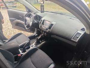 Black Mitsubishi Outlander 2012 in Riga, with an engine capacity of 2.20 L and mileage of 0 thousand km for 4550 €, photo 6 on AUTOMOTO.COM.LV