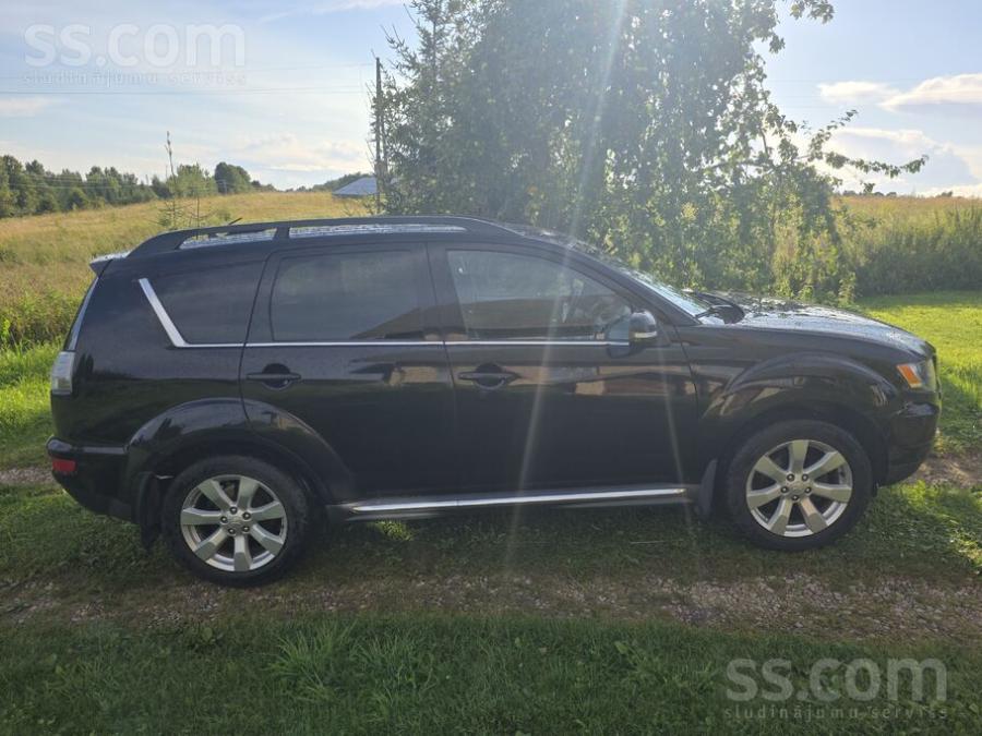 Melns Mitsubishi Outlander 2012 Aizkraukle, ar dzinēja tilpumu 2.40 L un nobraukumu 263 tūkst. km par 5500 €, foto 5 vietnē AUTOMOTO.COM.LV