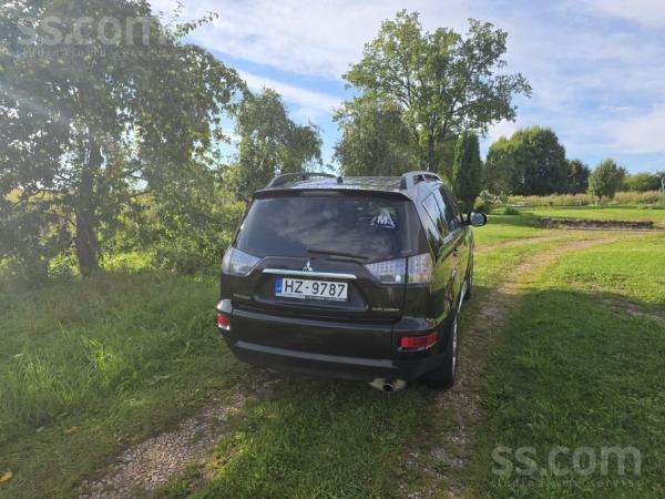 Melns Mitsubishi Outlander 2012 Aizkraukle, ar dzinēja tilpumu 2.40 L un nobraukumu 263 tūkst. km par 5500 €, foto 6 vietnē AUTOMOTO.COM.LV