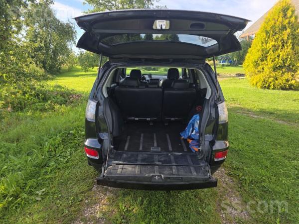 Melns Mitsubishi Outlander 2012 Aizkraukle, ar dzinēja tilpumu 2.40 L un nobraukumu 263 tūkst. km par 5500 €, foto 8 vietnē AUTOMOTO.COM.LV