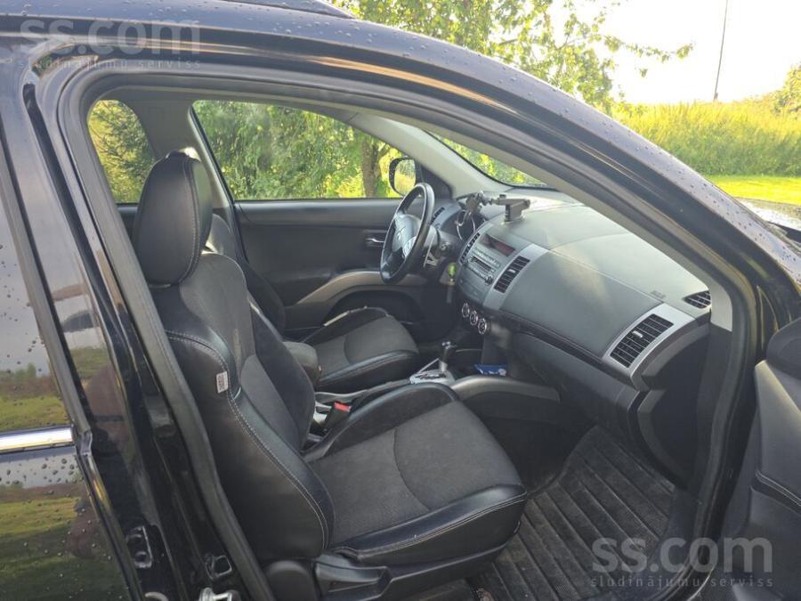 Melns Mitsubishi Outlander 2012 Aizkraukle, ar dzinēja tilpumu 2.40 L un nobraukumu 263 tūkst. km par 5500 €, foto 12 vietnē AUTOMOTO.COM.LV