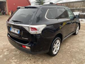 Melns Mitsubishi Outlander 2013 Tauragė, ar dzinēja tilpumu 2.27 L un nobraukumu 170 tūkst. km par 3300 €, foto 3 vietnē AUTOMOTO.COM.LV