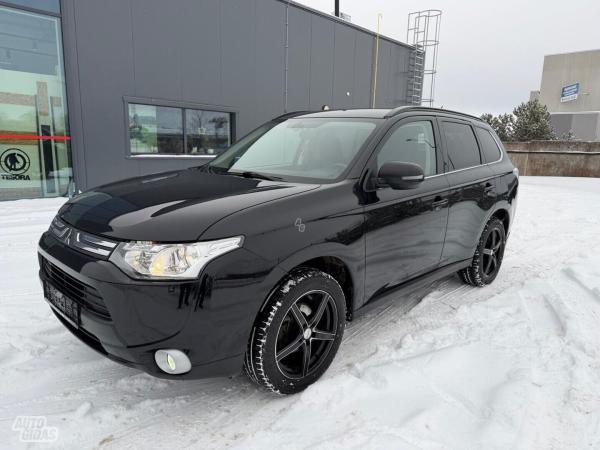 Black Mitsubishi Outlander 2013 in Siauliai, with an engine capacity of 2.30 L and mileage of 215 thousand km for 7350 €, photo 1 on AUTOMOTO.COM.LV