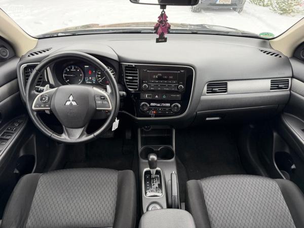 Black Mitsubishi Outlander 2013 in Siauliai, with an engine capacity of 2.30 L and mileage of 215 thousand km for 7350 €, photo 8 on AUTOMOTO.COM.LV