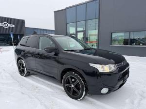 Black Mitsubishi Outlander 2013 in Siauliai, with an engine capacity of 2.30 L and mileage of 215 thousand km for 7350 €, photo 2 on AUTOMOTO.COM.LV