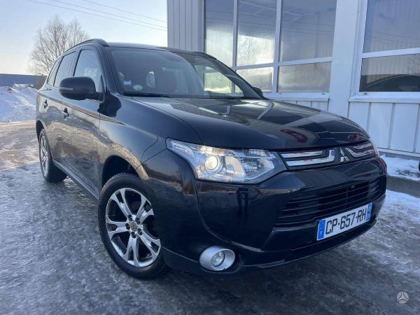 Melns Mitsubishi Outlander 2013 Tauragė, ar dzinēja tilpumu 2.27 L un nobraukumu 207 tūkst. km par 6300 €, foto 1 vietnē AUTOMOTO.COM.LV