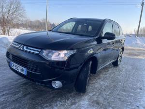Melns Mitsubishi Outlander 2013 Tauragė, ar dzinēja tilpumu 2.27 L un nobraukumu 207 tūkst. km par 6300 €, foto 2 vietnē AUTOMOTO.COM.LV