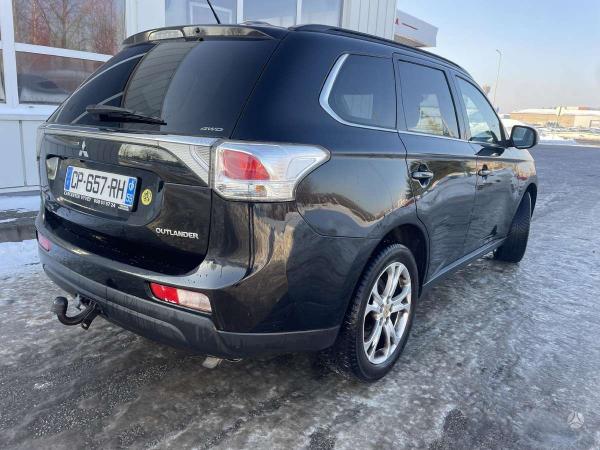 Melns Mitsubishi Outlander 2013 Tauragė, ar dzinēja tilpumu 2.27 L un nobraukumu 207 tūkst. km par 6300 €, foto 4 vietnē AUTOMOTO.COM.LV