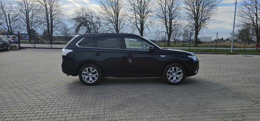 Melns Mitsubishi Outlander 2013 Kauņa, ar dzinēja tilpumu 2.00 L un nobraukumu 300 tūkst. km par 6850 €, foto 9 vietnē AUTOMOTO.COM.LV