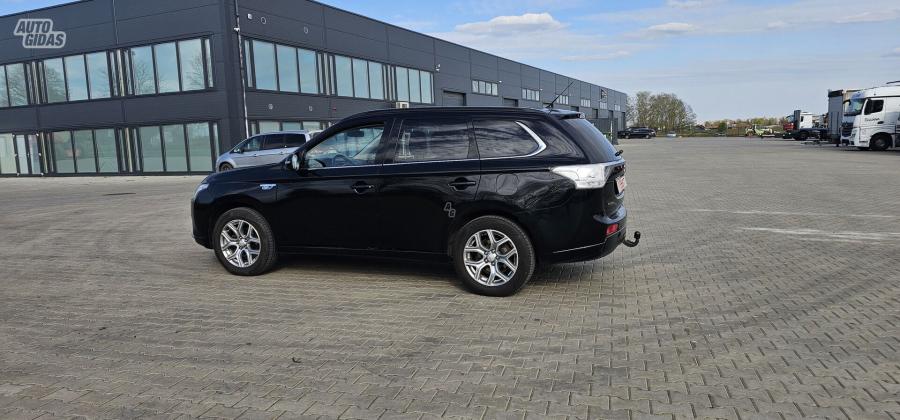 Melns Mitsubishi Outlander 2013 Kauņa, ar dzinēja tilpumu 2.00 L un nobraukumu 300 tūkst. km par 6850 €, foto 13 vietnē AUTOMOTO.COM.LV
