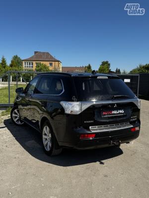 Black Mitsubishi Outlander 2013 in Klaipeda, with an engine capacity of 2.00 L and mileage of 294 thousand km for 6499 €, photo 7 on AUTOMOTO.COM.LV