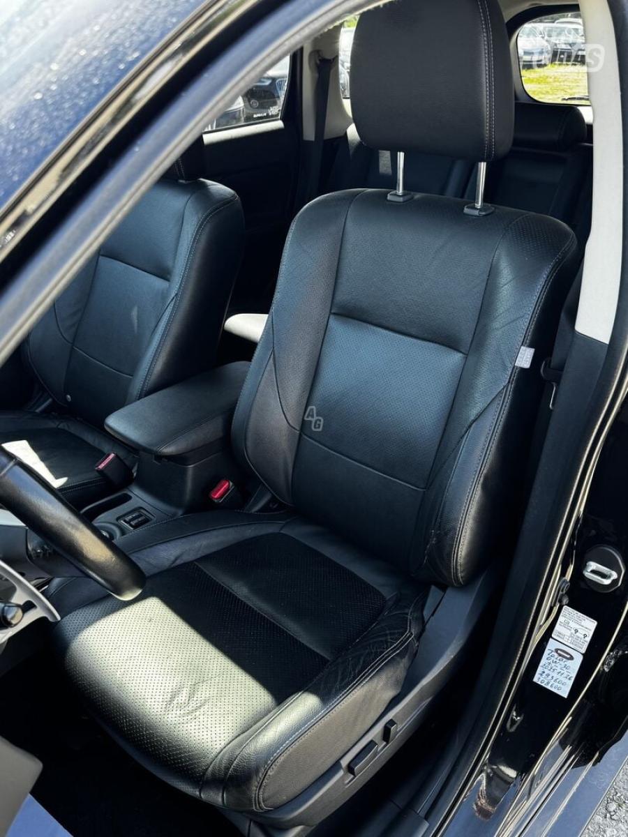 Black Mitsubishi Outlander 2013 in Klaipeda, with an engine capacity of 2.00 L and mileage of 294 thousand km for 6499 €, photo 13 on AUTOMOTO.COM.LV
