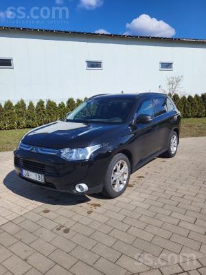 Melns Mitsubishi Outlander 2013 Rīga, ar dzinēja tilpumu 2.00 L un nobraukumu 97 tūkst. km par 9000 €, foto 3 vietnē AUTOMOTO.COM.LV