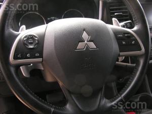 Black Mitsubishi Outlander 2013 in Riga, with an engine capacity of 2.00 L and mileage of 258 thousand km for 7500 €, photo 13 on AUTOMOTO.COM.LV