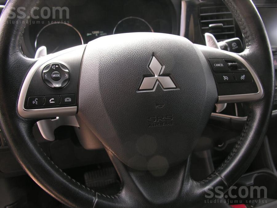 Black Mitsubishi Outlander 2013 in Riga, with an engine capacity of 2.00 L and mileage of 258 thousand km for 7500 €, photo 13 on AUTOMOTO.COM.LV