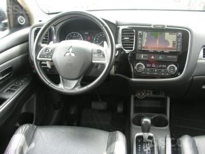 Black Mitsubishi Outlander 2013 in Riga, with an engine capacity of 2.00 L and mileage of 258 thousand km for 7500 €, photo 19 on AUTOMOTO.COM.LV