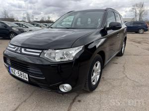Black Mitsubishi Outlander 2013 in Riga, with an engine capacity of 2.00 L and mileage of 243 thousand km for 8760 €, photo  on AUTOMOTO.COM.LV
