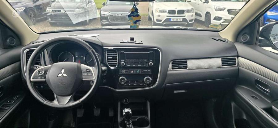 Black Mitsubishi Outlander 2013 in Siauliai, with an engine capacity of 2.27 L and mileage of 270 thousand km for 5900 €, photo 10 on AUTOMOTO.COM.LV