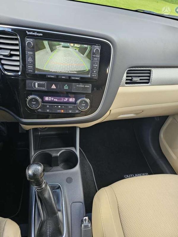 Melns Mitsubishi Outlander 2013 Ukmergė, ar dzinēja tilpumu 2.27 L un nobraukumu 224 tūkst. km par 7300 €, foto 4 vietnē AUTOMOTO.COM.LV