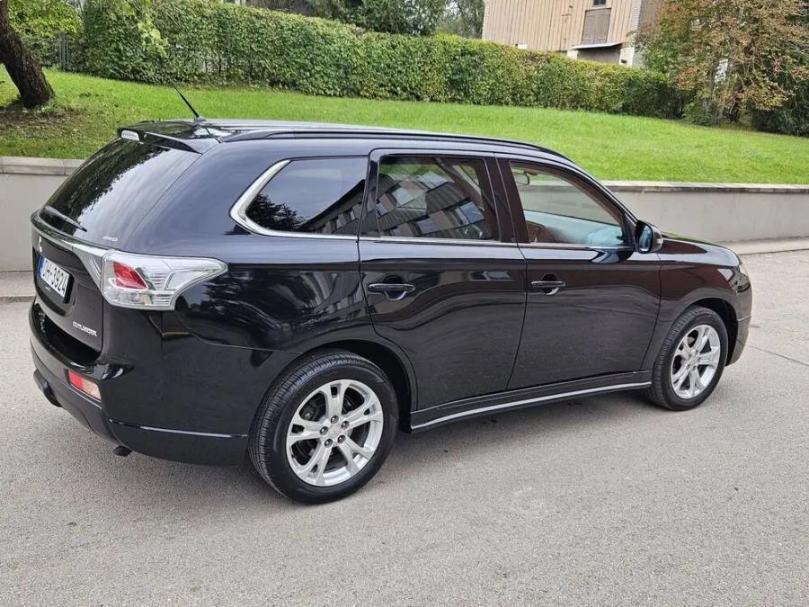 Melns Mitsubishi Outlander 2013 Jēkabpils, ar dzinēja tilpumu 2.20 L un nobraukumu 187 tūkst. km par 9490 €, foto 6 vietnē AUTOMOTO.COM.LV