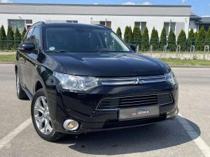 Black Mitsubishi Outlander 2013 in Vilnius, with an engine capacity of 2.00 L and mileage of 278 thousand km for 7650 €, photo 18 on AUTOMOTO.COM.LV
