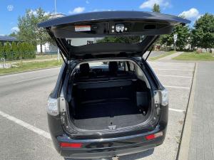 Black Mitsubishi Outlander 2013 in Vilnius, with an engine capacity of 2.00 L and mileage of 278 thousand km for 7650 €, photo 34 on AUTOMOTO.COM.LV
